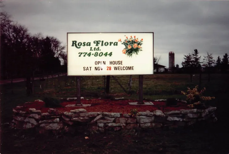 Rosa Flora road sign welcomes visitors to an open house party